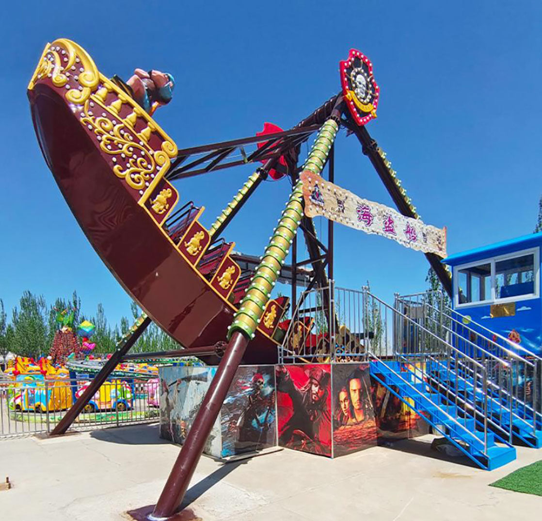 Fairground outdoor amusement family play park ride pirate ship ...